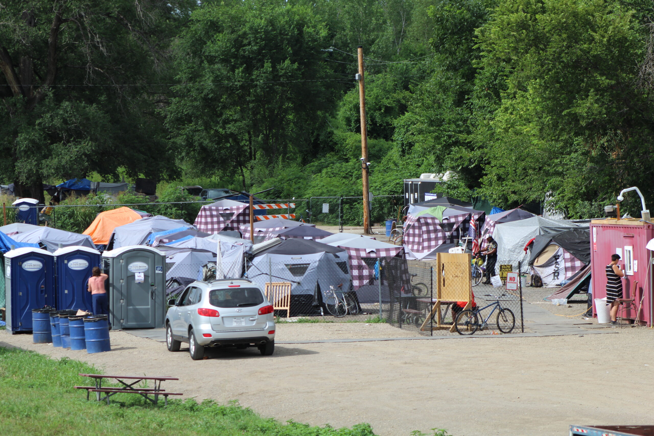 City of Lawrence will support people at homeless camp despite prior ...